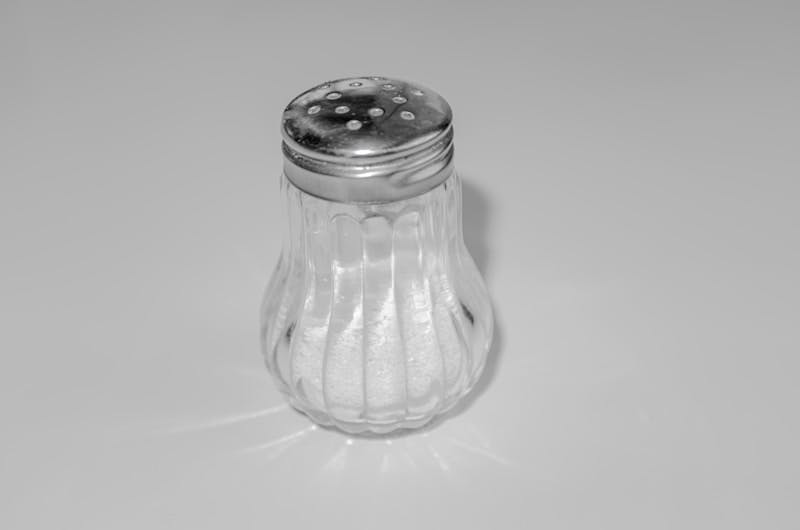 Why does salt make food taste better?